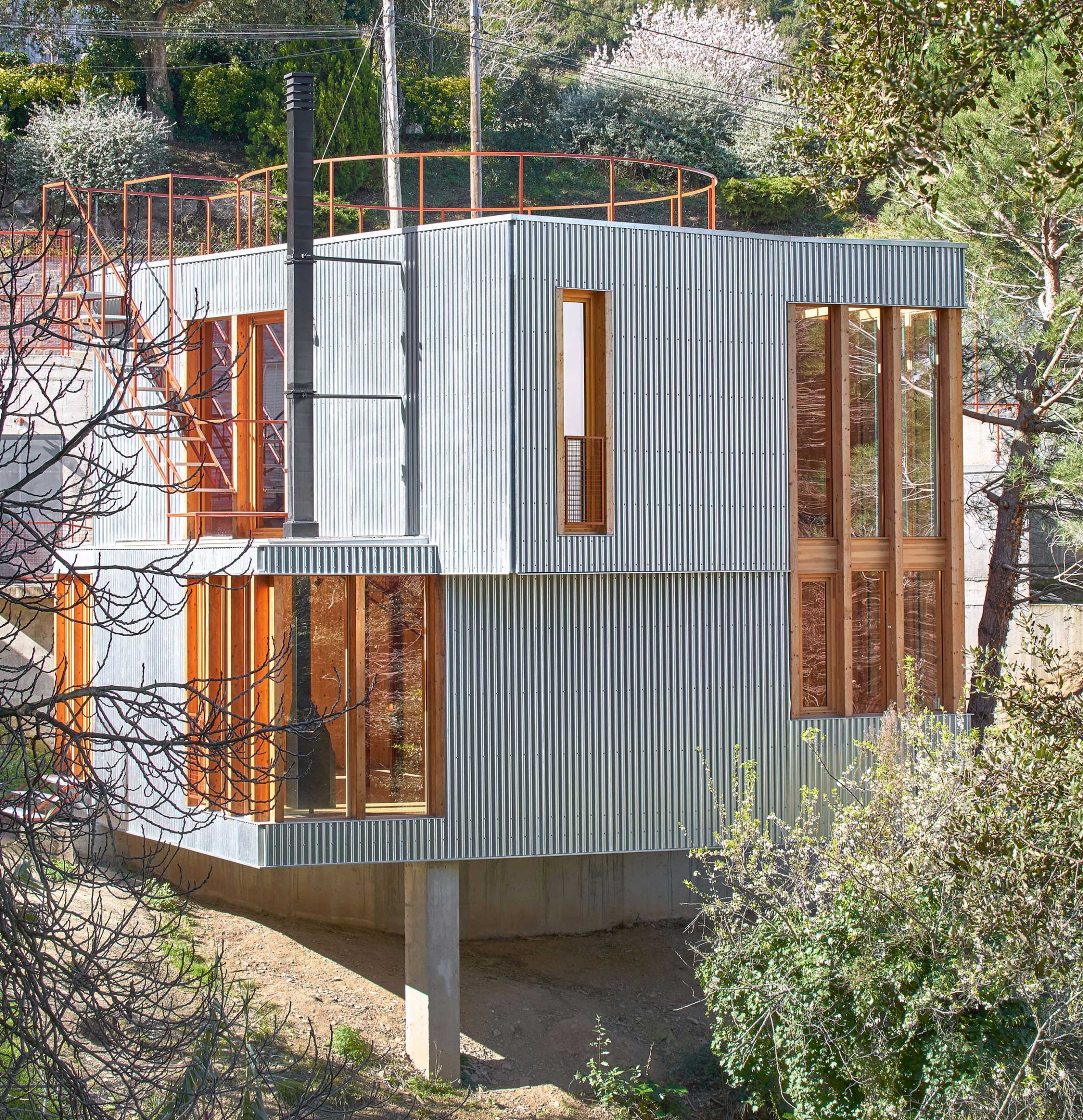 Arquitectura-G’s simple wood and steel construction replaces an old ...